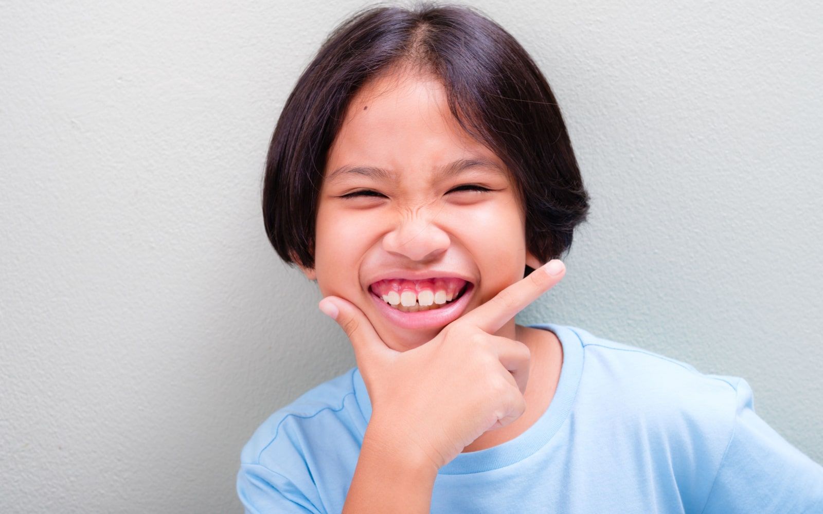 What Causes a Gummy Smile and Can it Be Fixed? - Massih Orthodontics